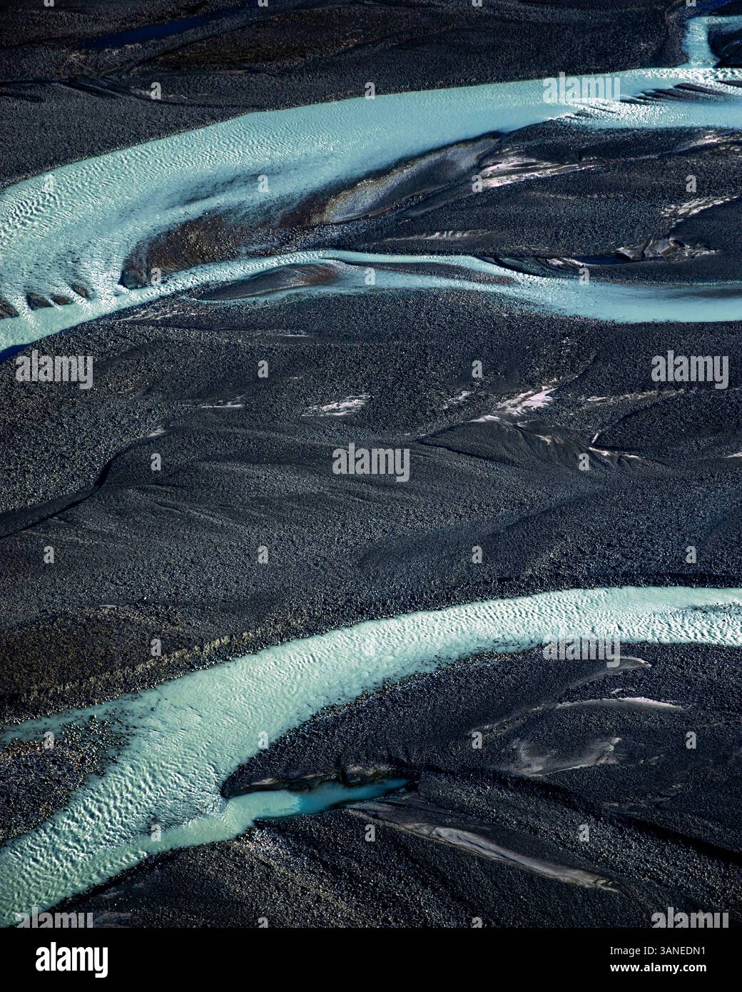 Aerial view of blue glacial rivers and textures melting from Tasman ...