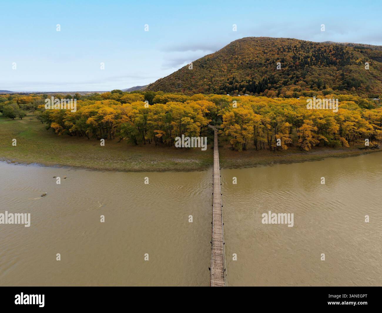Aerial view of a small footbridge crossing Mtkvari river near ...