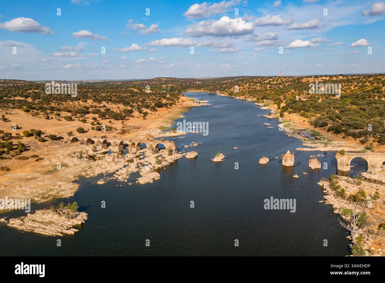 Aerial view of Puente Ayuda, a collapsed stone bridge crossing the ...