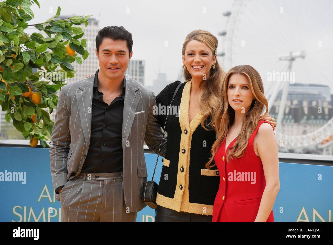 Henry Golding, from left, Blake Lively and Anna Kendrick pose for ...
