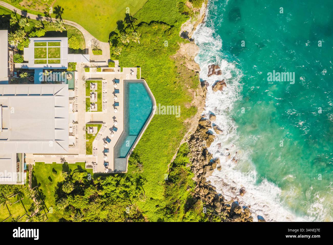 Aerial view of a luxury resort with swimming pool surrounded by ...