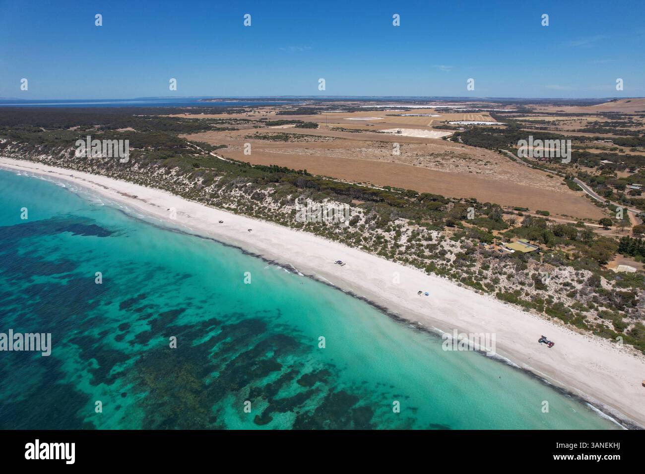 Aerial view of beautiful Emu Bay beach with turquoise water and clear ...