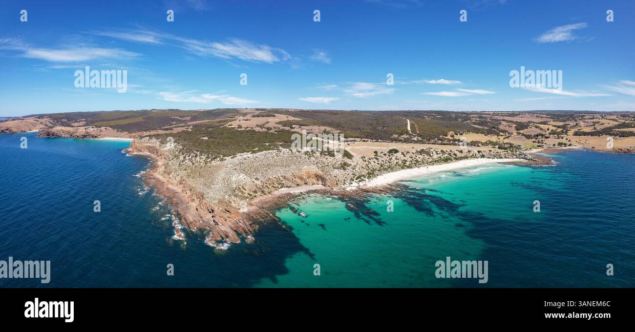 Aerial view of Stokes Bay Beach with sandy shoreline and tranquil blue ...