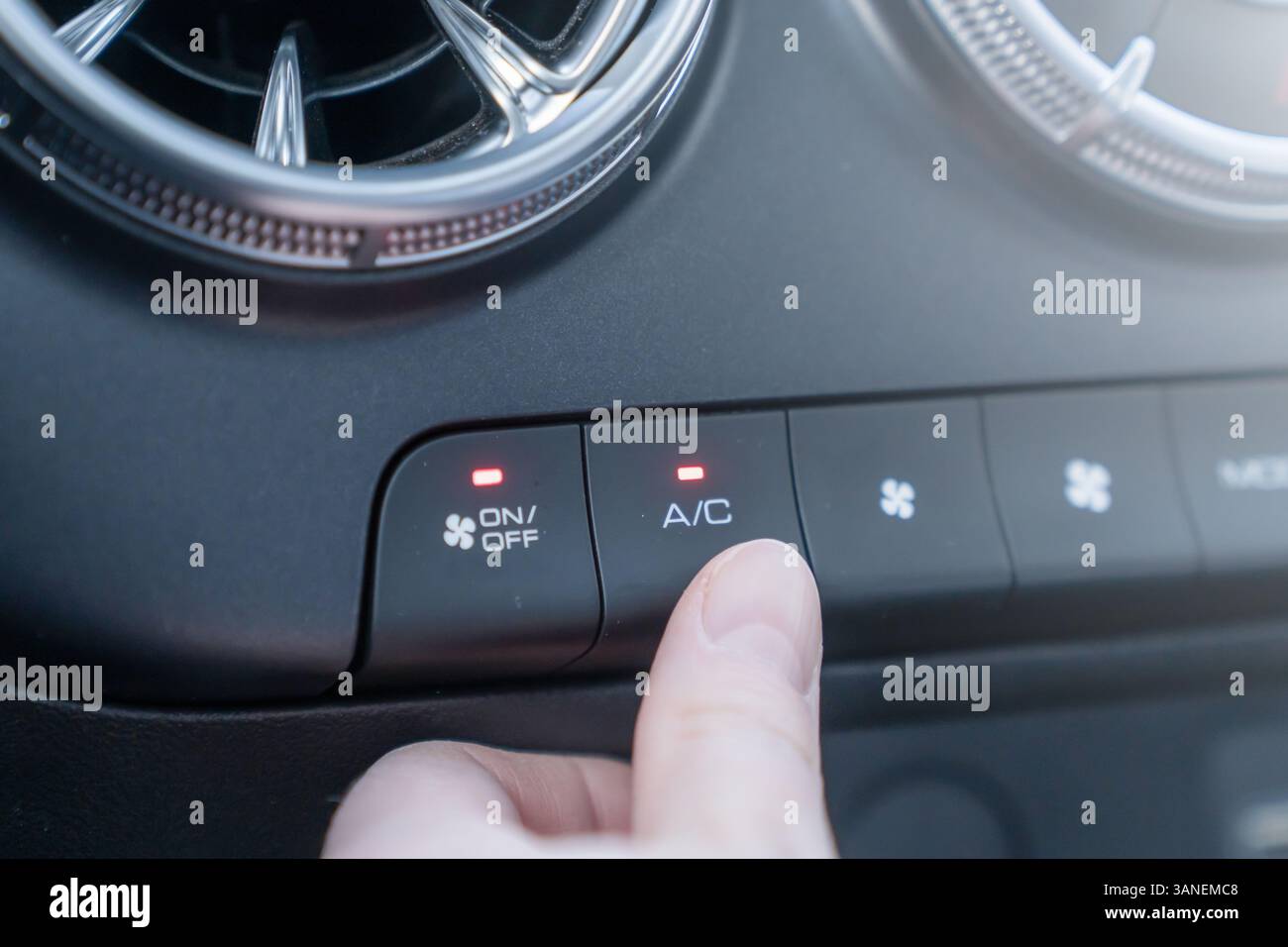 Closeup of car climate control buttons, highlighting automatic air ...