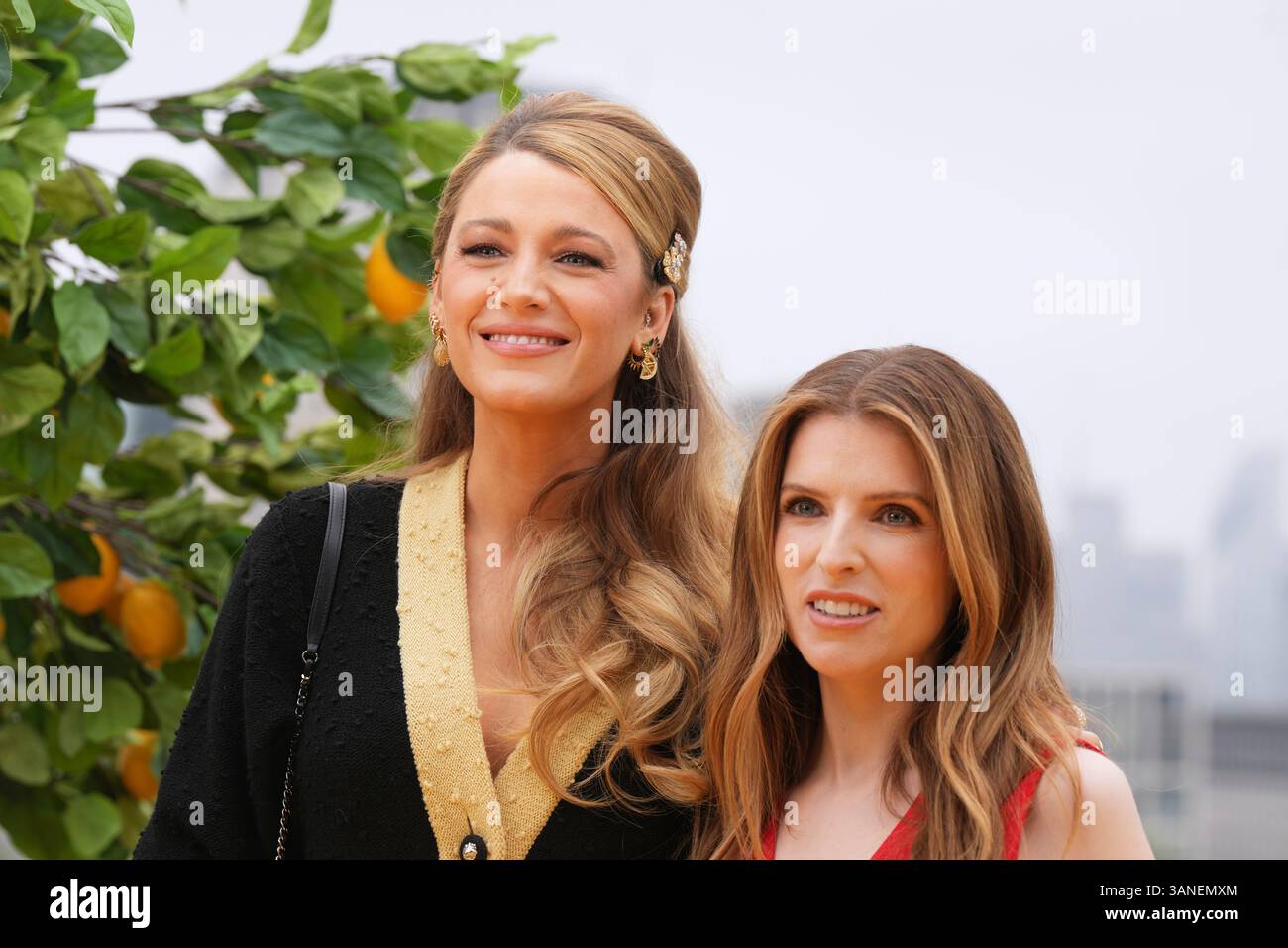 Blake Lively, left, and Anna Kendrick pose for photographers at the ...