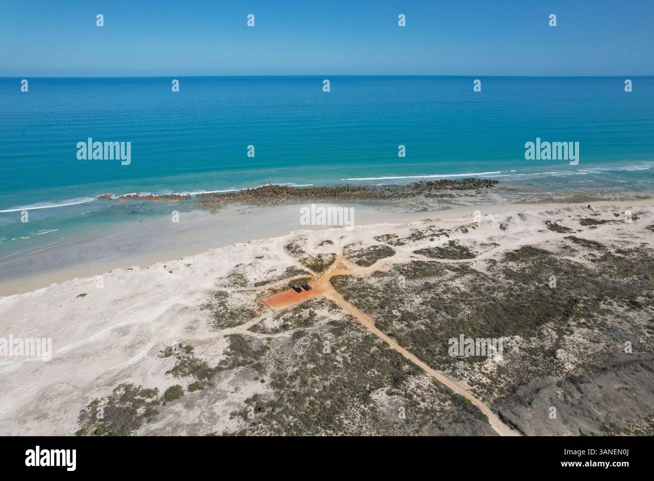 Aerial view of beautiful Coconut Well Rock Pools with tranquil ocean ...