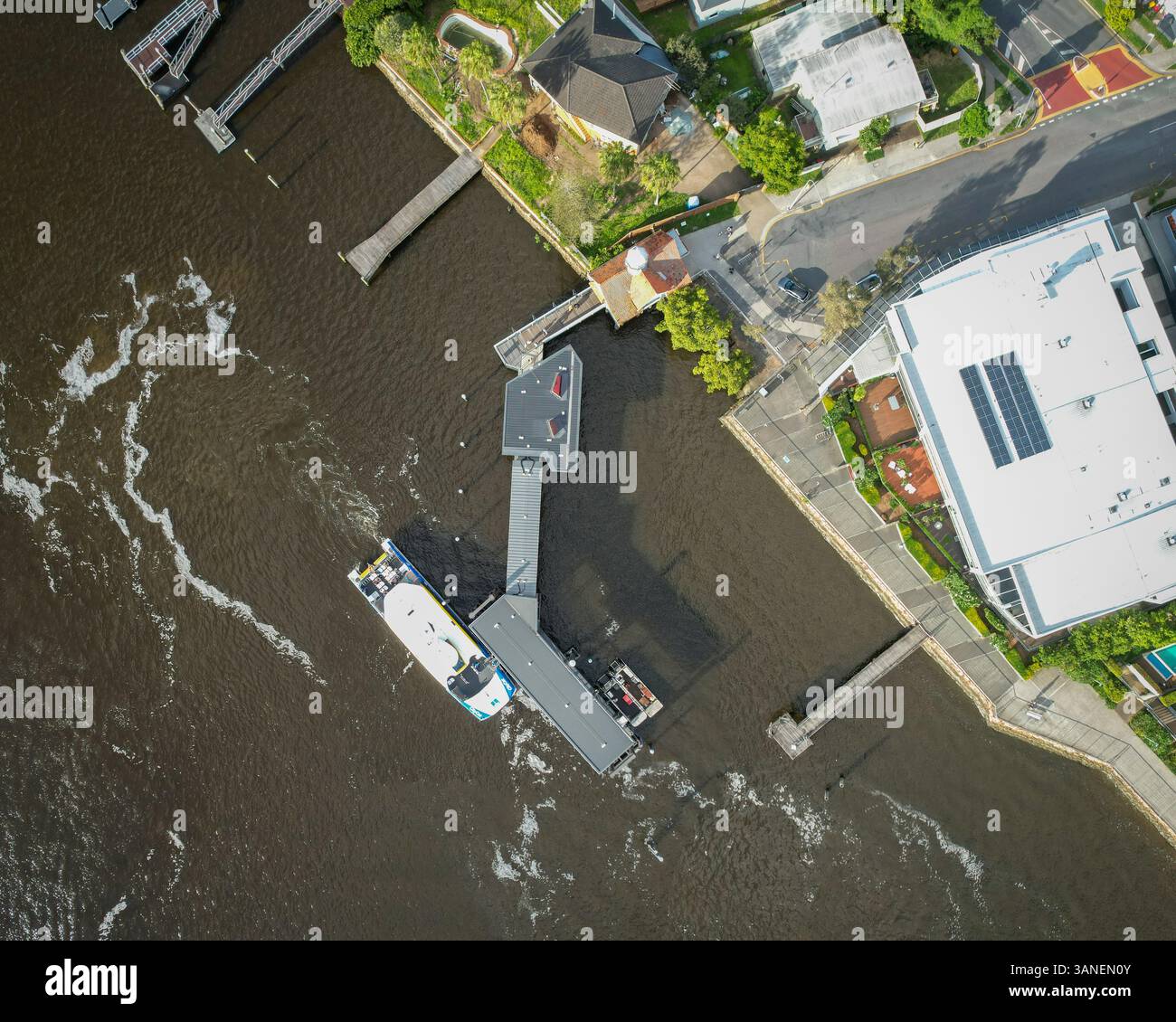 Aerial view of Brisbane River with Bulimba Ferry terminal and ...