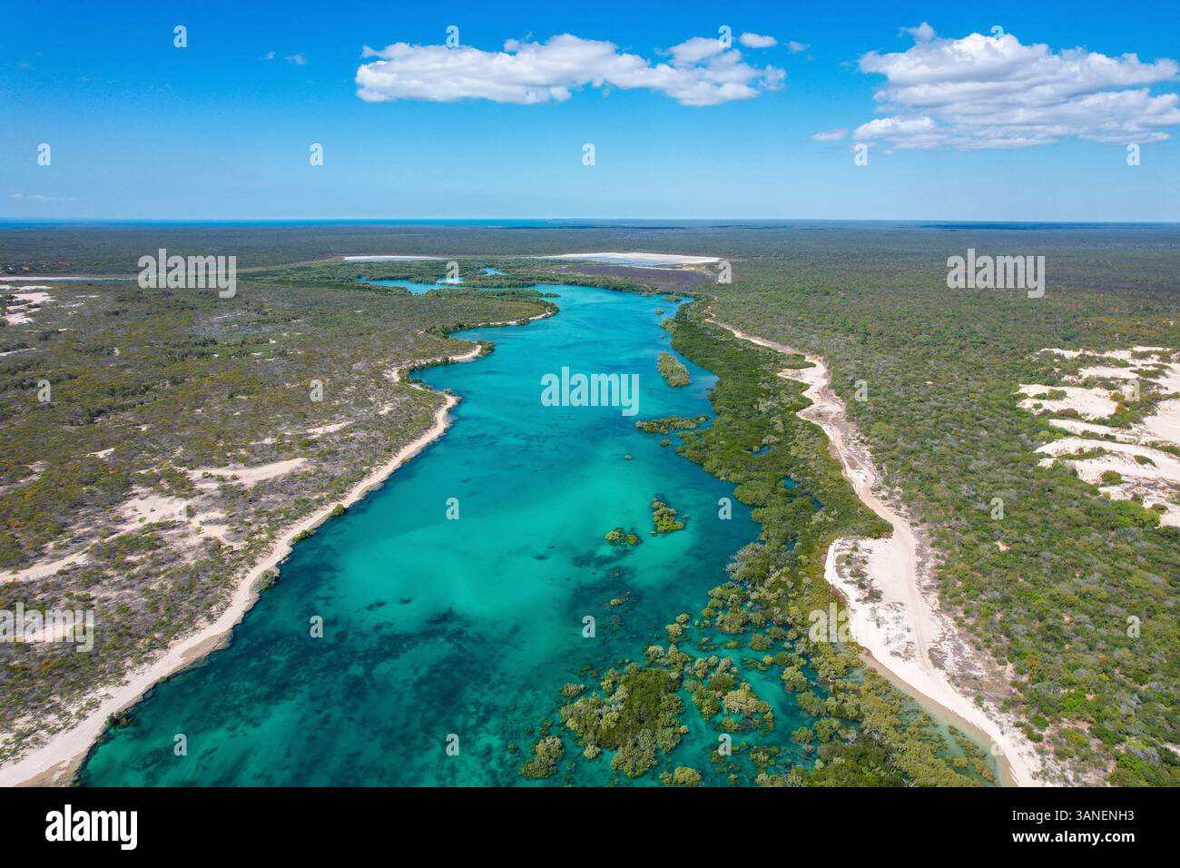 Aerial view of the beautiful and pristine Lombadina Creek winding ...