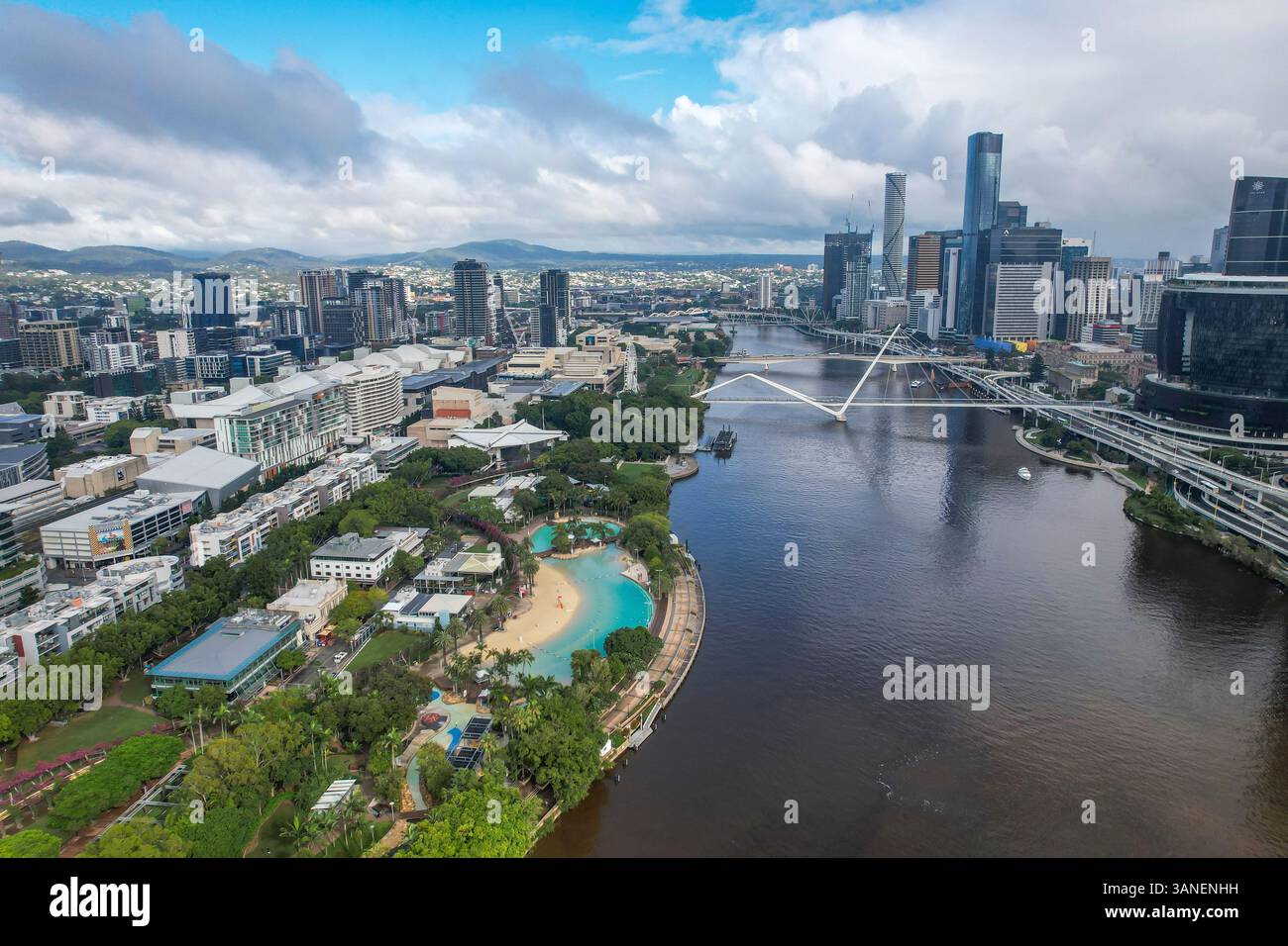 Aerial view of Streets Beach and Lagoon Brisbane surrounded by high ...