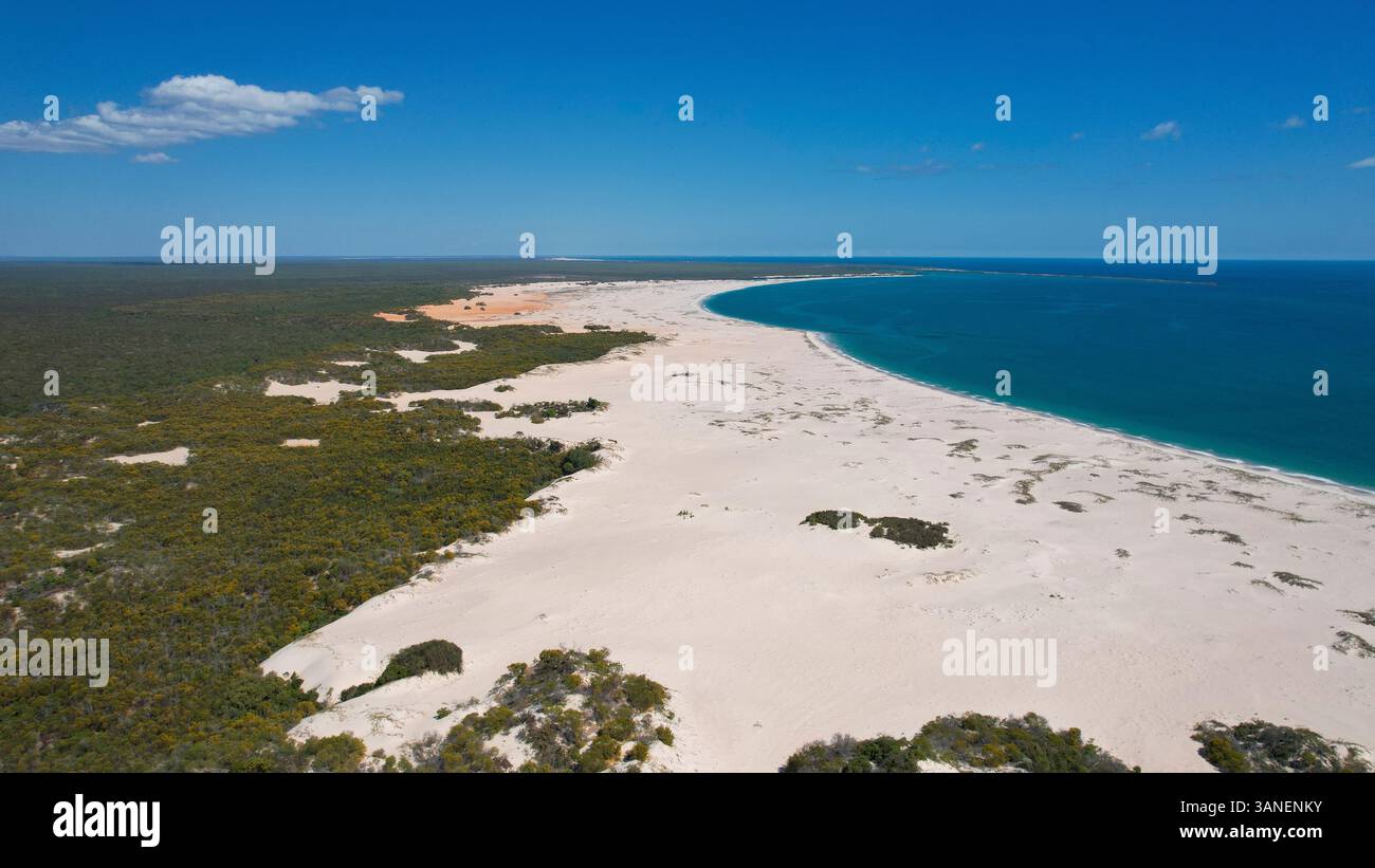 Aerial view of Ngamakoon Creek and Gulumonon Bay with pristine beach and tranquil ocean, Dampier ...
