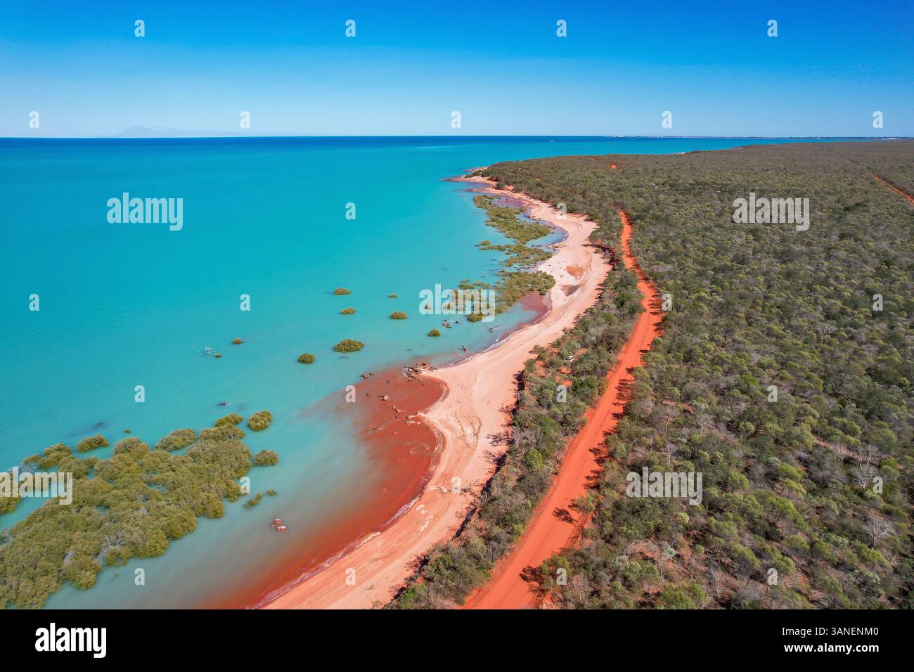 Aerial view of red sand beach and turquoise water in Roebuck Bay ...