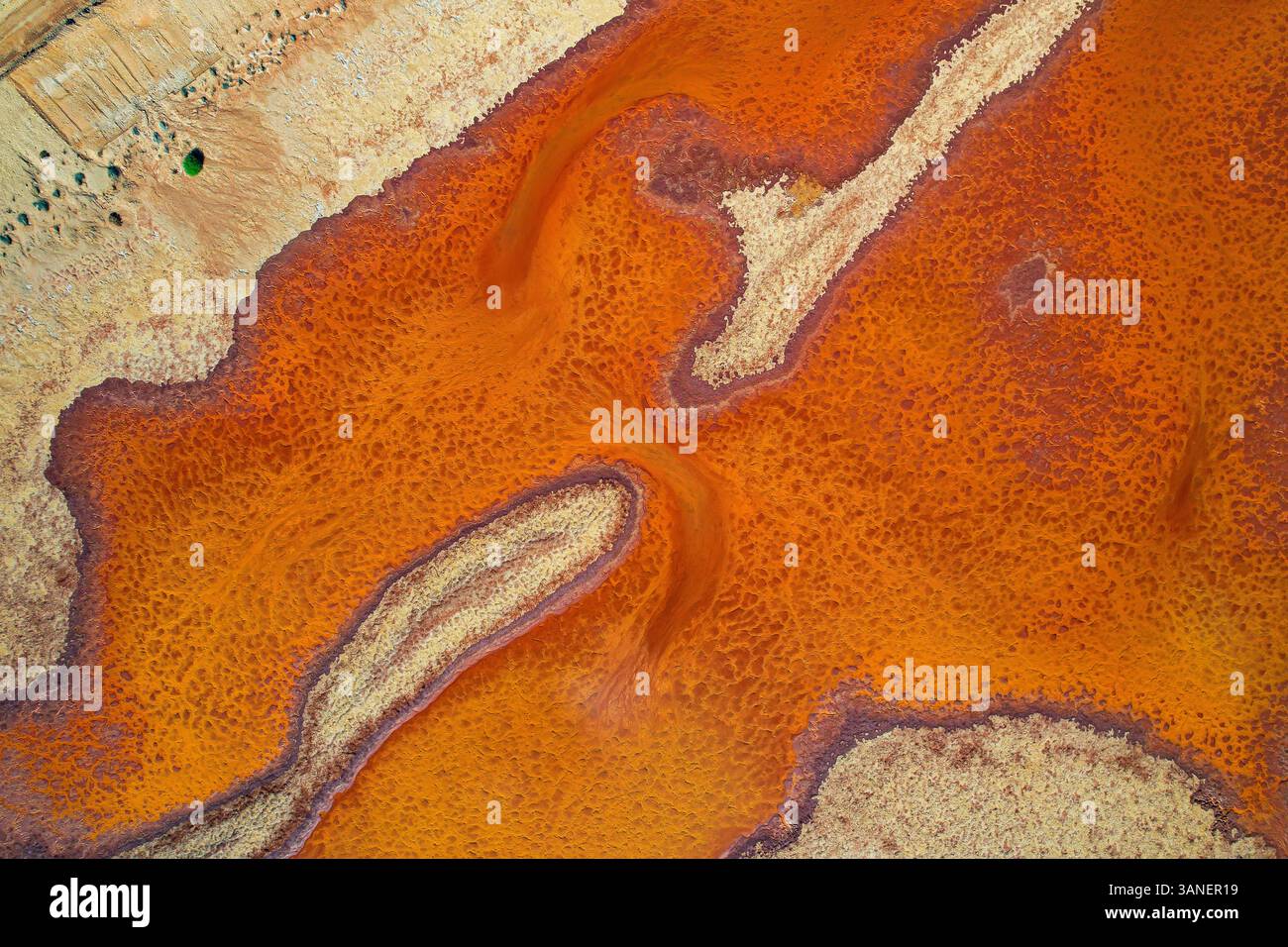Aerial view of abstract patterns and vibrant colors of Redbank salt ...