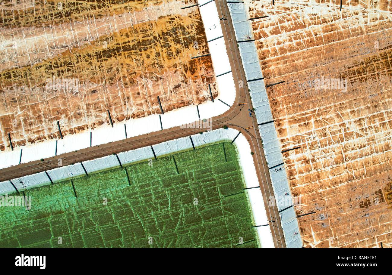 Aerial view of ammonium nitrate plant with geometric patterns and ...