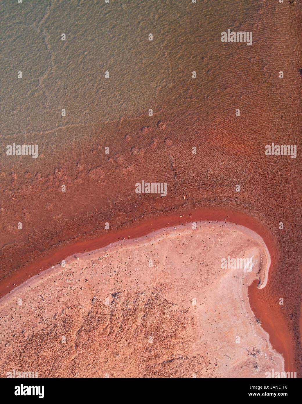 Aerial view of colorful salt pond with unique patterns and textures ...