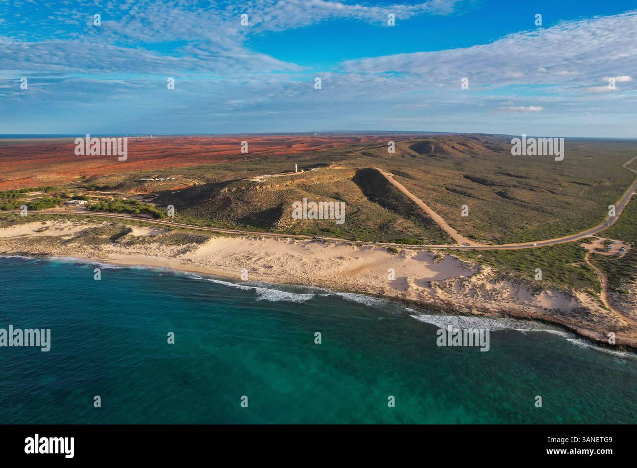 Aerial view of Vlamingh Head Lighthouse and Dunes Beach with blue ocean ...