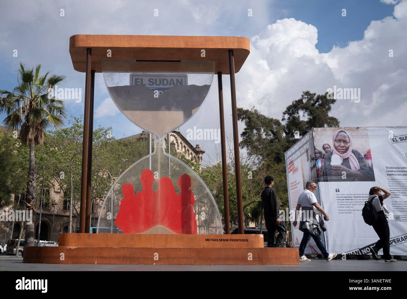 An hourglass installed by Médecins Sans Frontières (MSF), at the Plaça ...