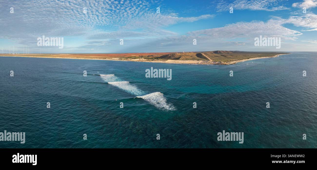 Aerial view of Vlamingh Head Lighthouse and surf break at Dunes Beach ...