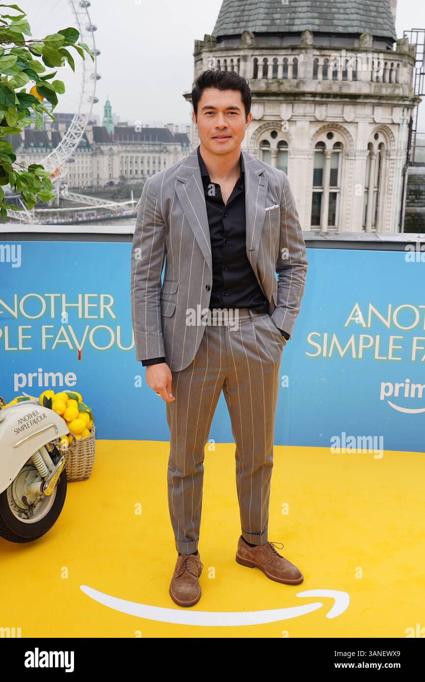 Henry Golding at a photocall for Another Simple Favour at the Corinthia ...