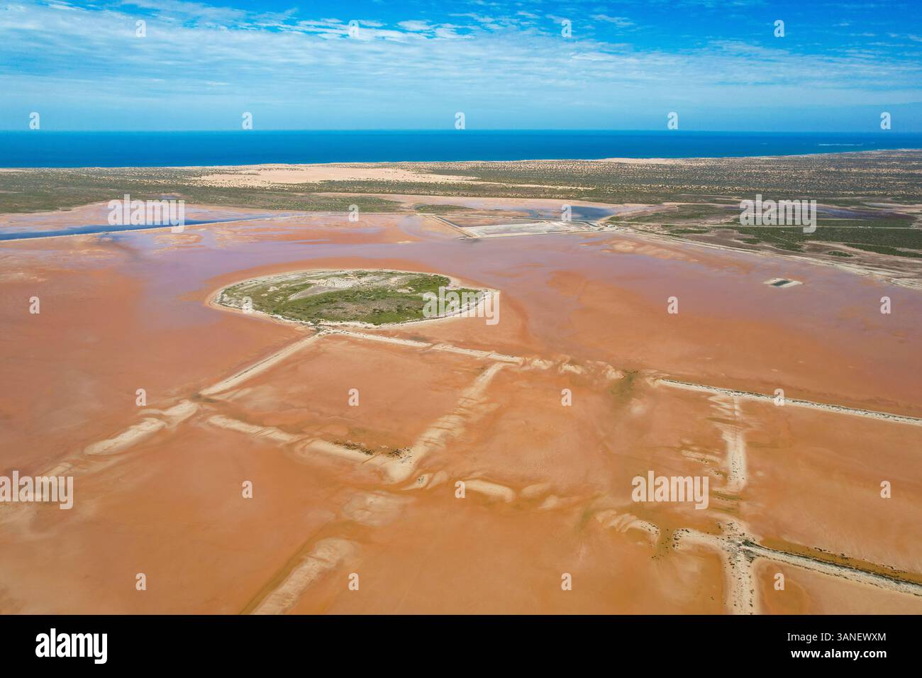 Aerial view of Lake MacLeod with mining farm in a vast and arid ...
