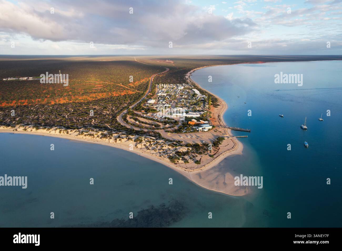 Aerial view of the beautiful coastline and tranquil beach with boats at ...