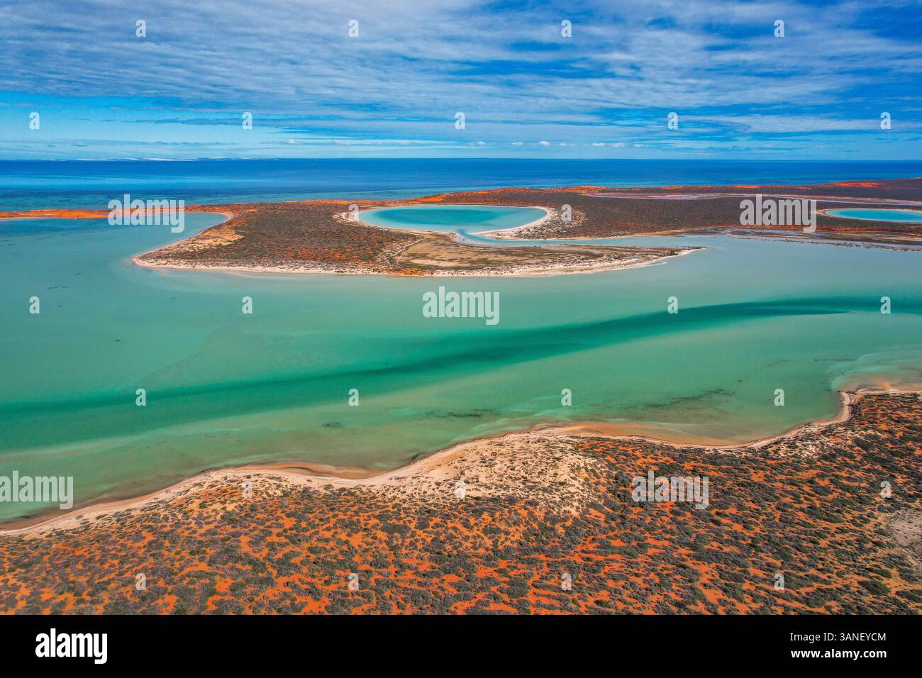 Aerial view of big lagoon with turquoise water and pristine coastline ...