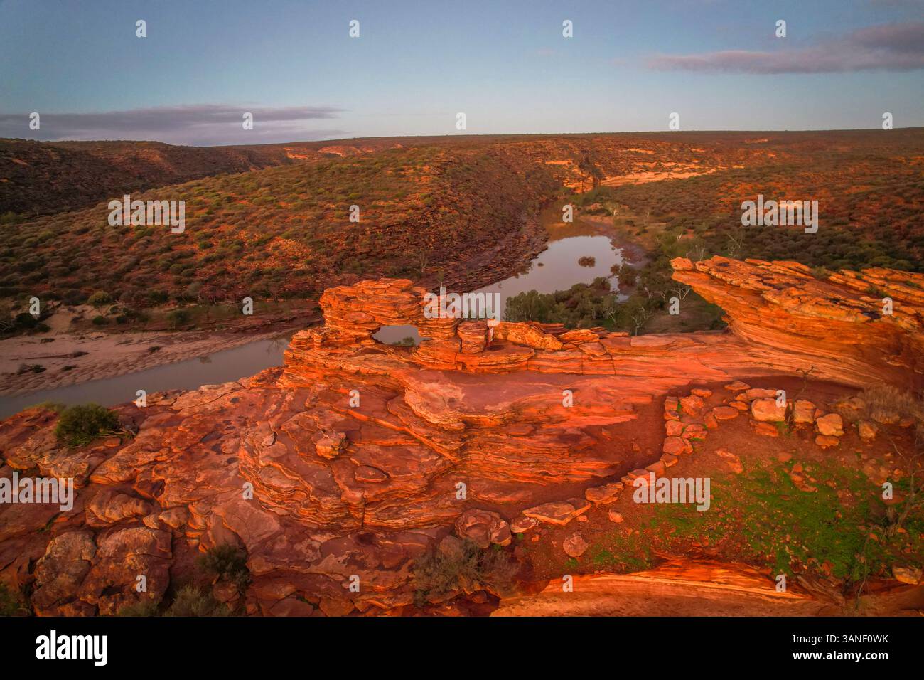 Aerial view of nature's window rock formation and the winding Murchison ...