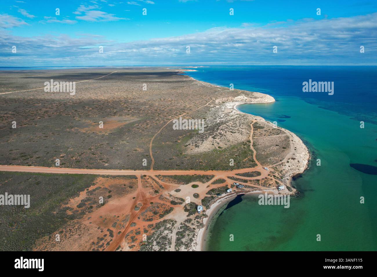 Aerial view of the beautiful Whalebone campsite with a clear beach and ...