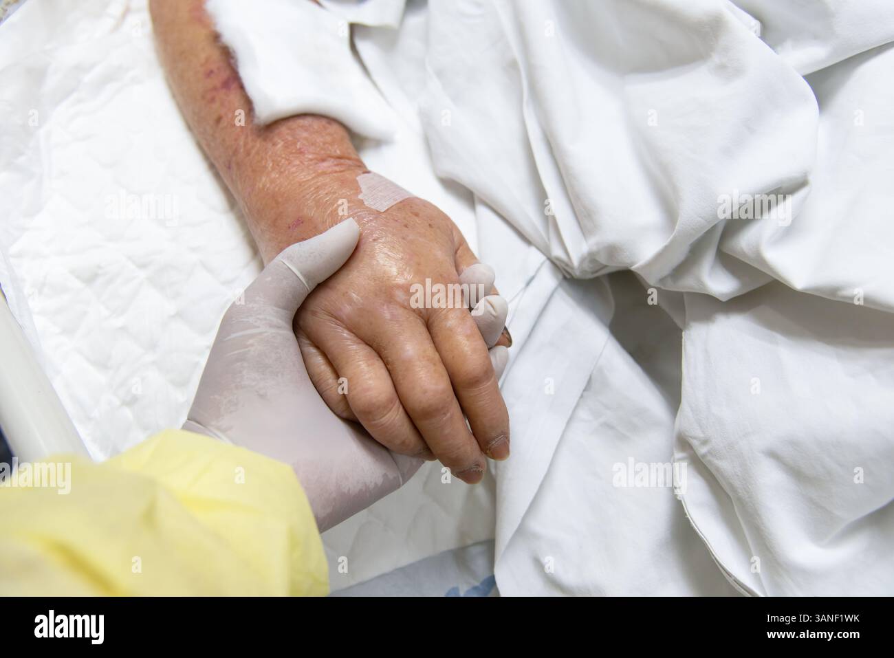Patient in the hospital with saline intravenous and relatives patient ...