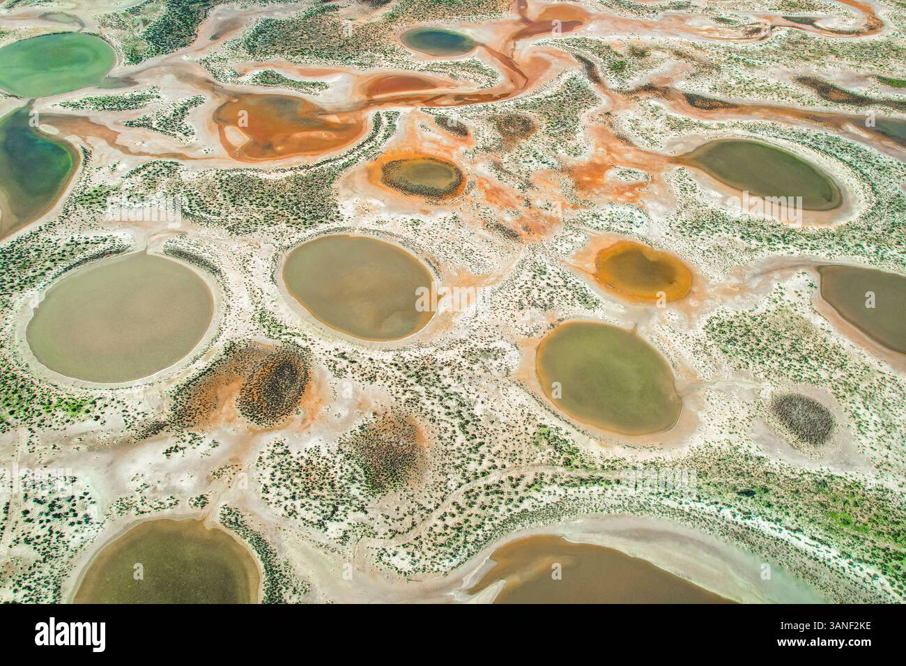 Aerial view of vibrant and abstract dry lakes with unique patterns ...