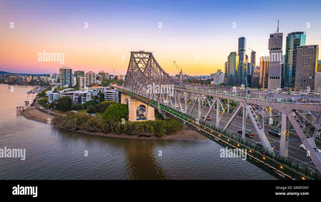 Aerial view of Brisbane city skyline at sunset with Story Bridge and ...