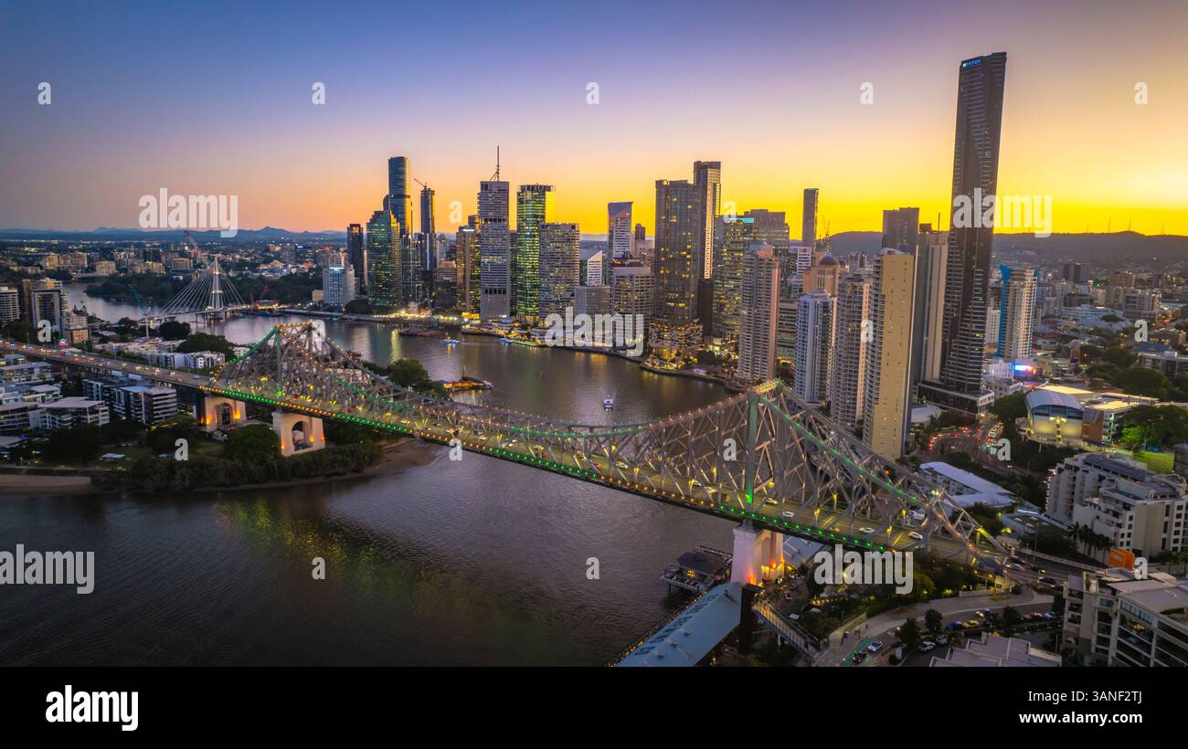 Aerial view of Brisbane City skyline at sunset with Story Bridge ...