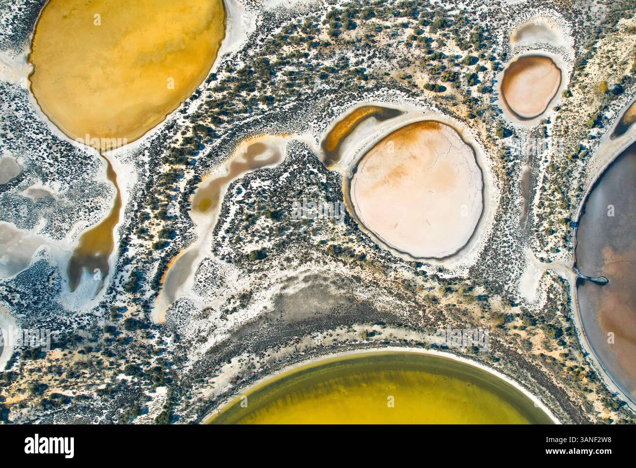 Aerial view of abstract salt lakes with unique patterns and textures ...
