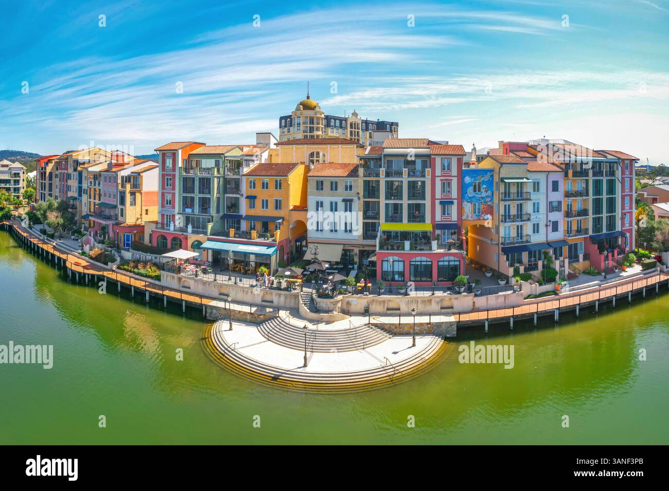 Aerial view of colorful buildings by the lake with modern architecture ...