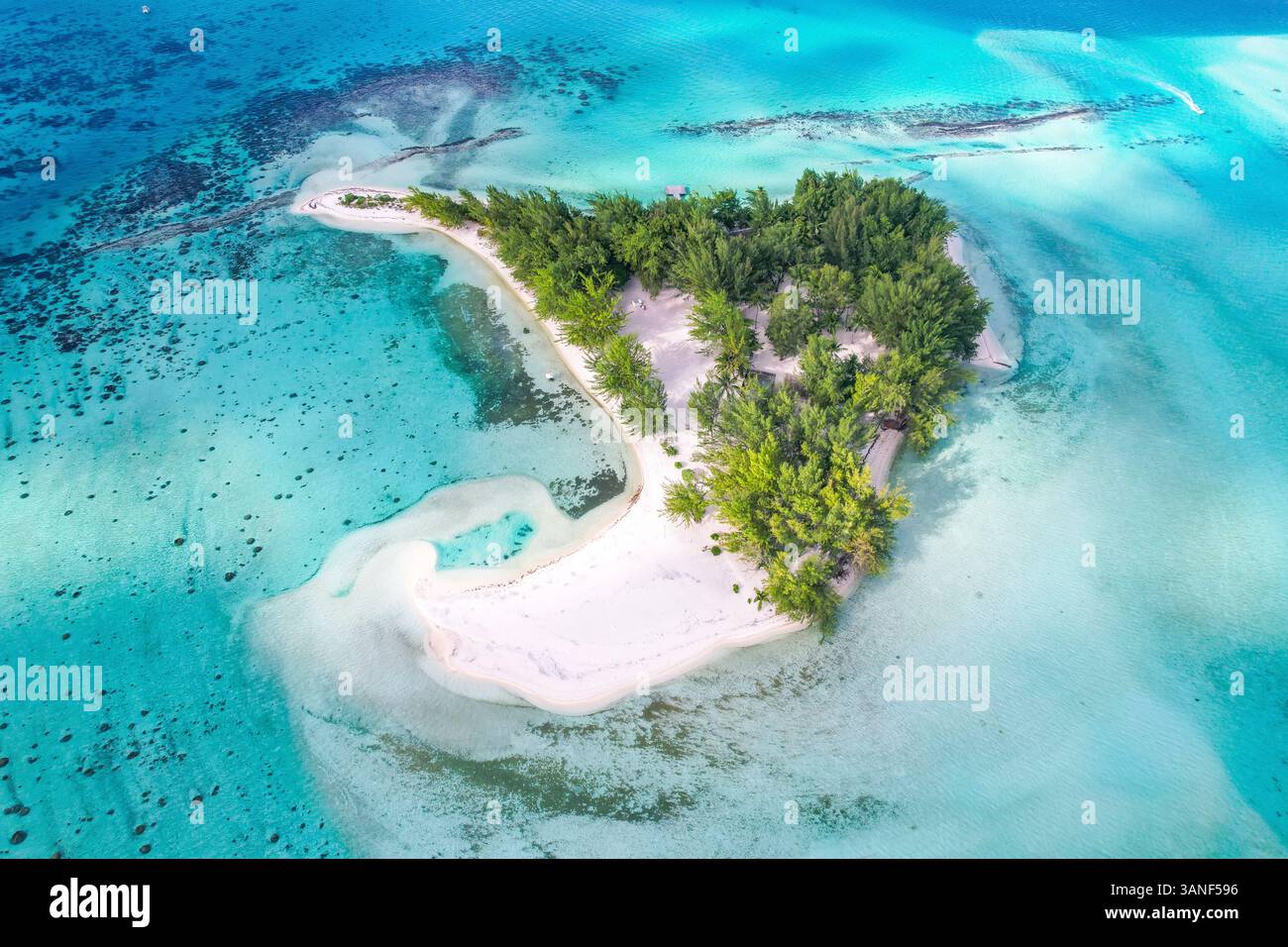 Aerial view of turquoise lagoon in Bora Bora, Motu Tapu, French ...