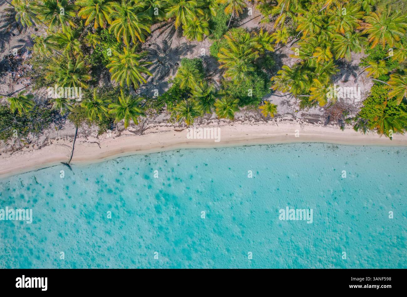Aerial view of turquoise waters and sandy beaches, Bora Bora Lagoon, Motu Piti A'au, French ...