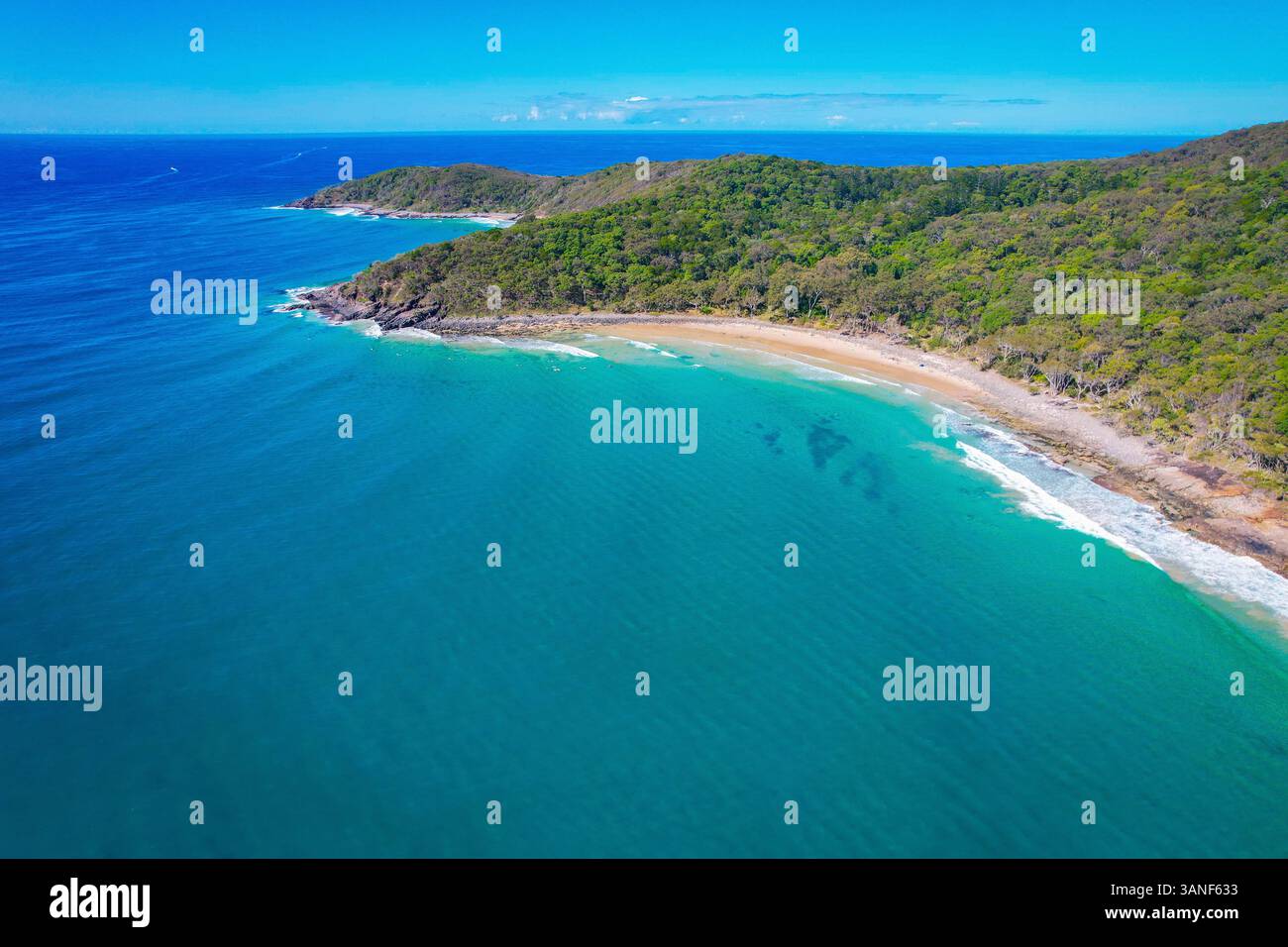 Aerial view of Tea Tree Bay Beach overlooking Coral Sea, Noosa National ...