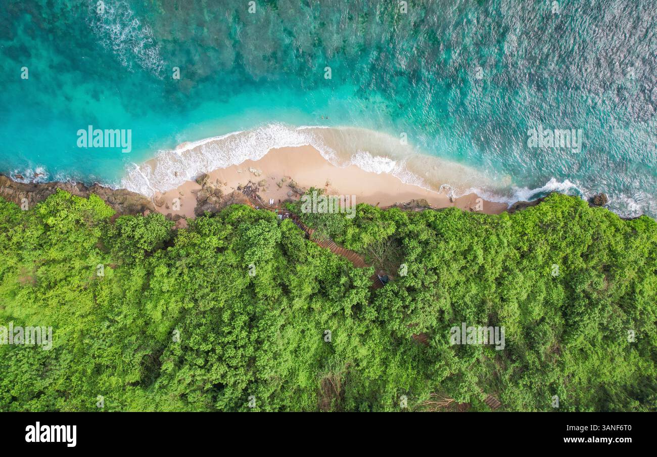 Aerial view of turquoise waters and sandy beach at Green Bowl Beach ...