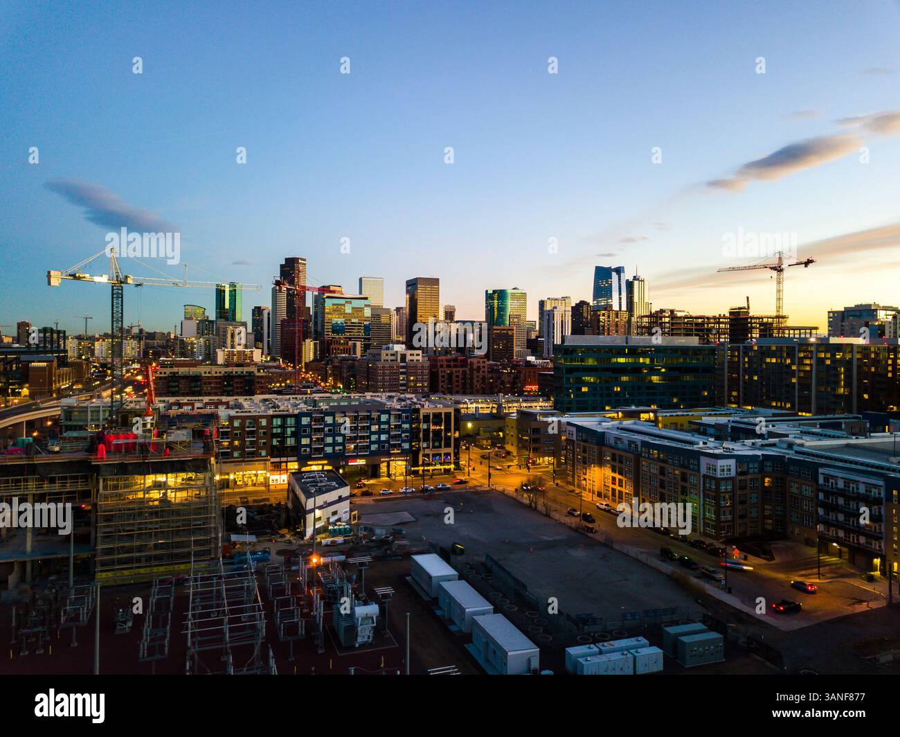 Aerial view of city skyline, buildings, crane, constructions in Denver ...