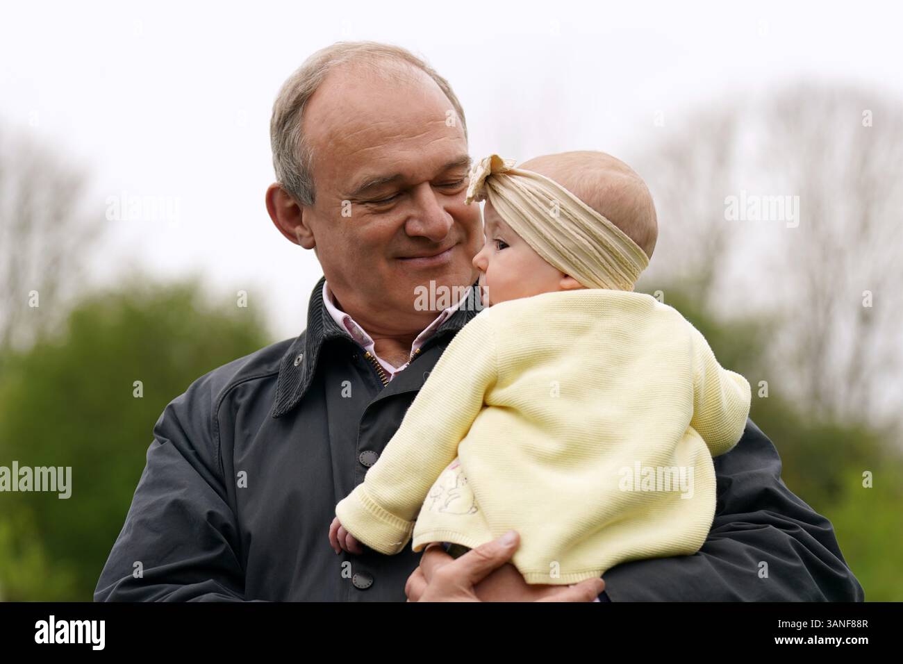 Liberal Democrats leader Sir Ed Davey holding 5 month old baby Fearne ...