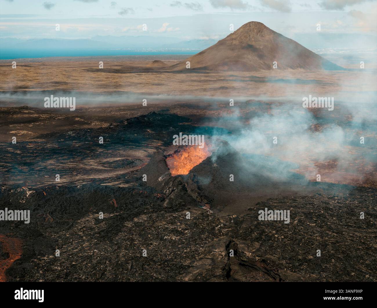 Aerial view of Litli-Hrutur (Little Ram) Volcano during an eruption on ...