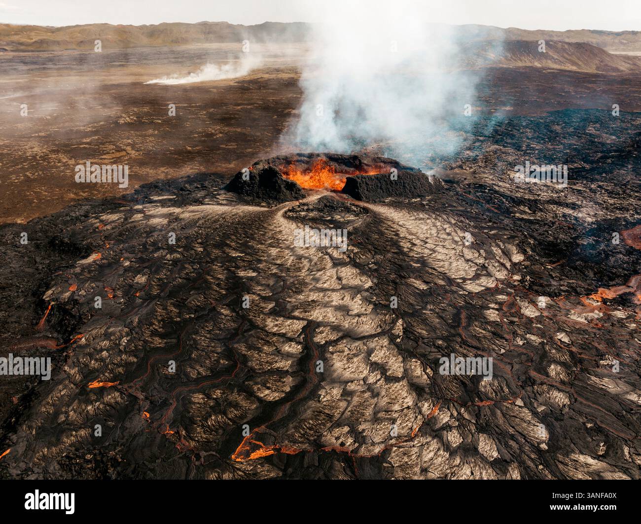 Aerial view of Litli-Hrutur (Little Ram) Volcano during an eruption on ...