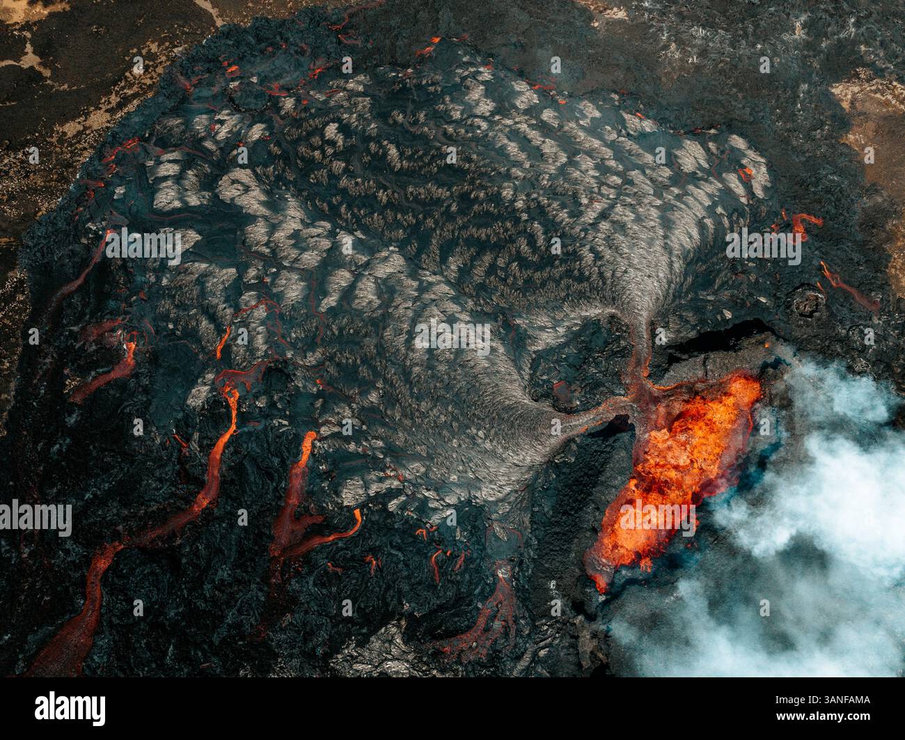 Aerial view of Litli-Hrutur (Little Ram) Volcano during an eruption on ...