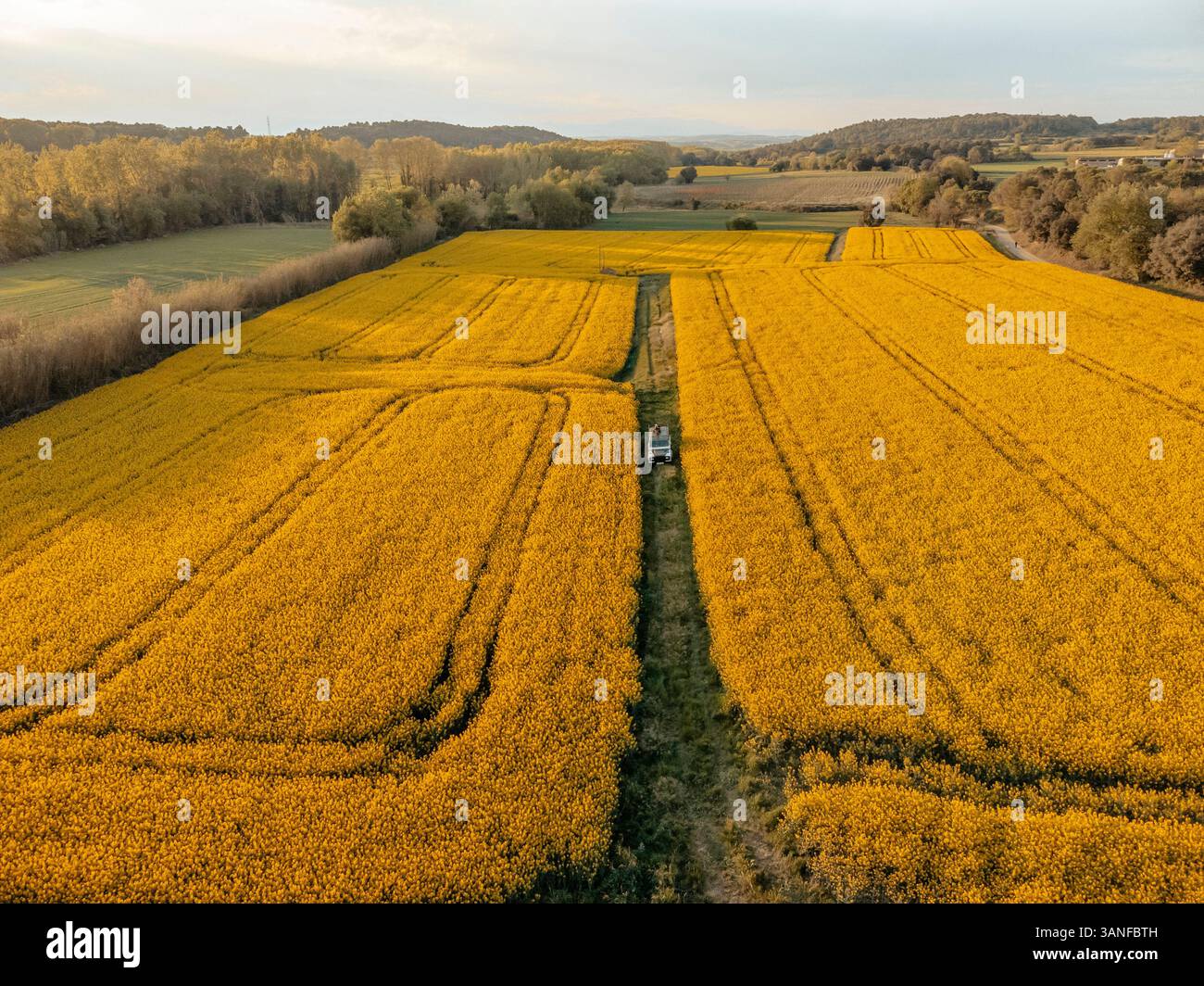 Aerial view of a motorhome driving in the countryside, La Pera, Girona ...