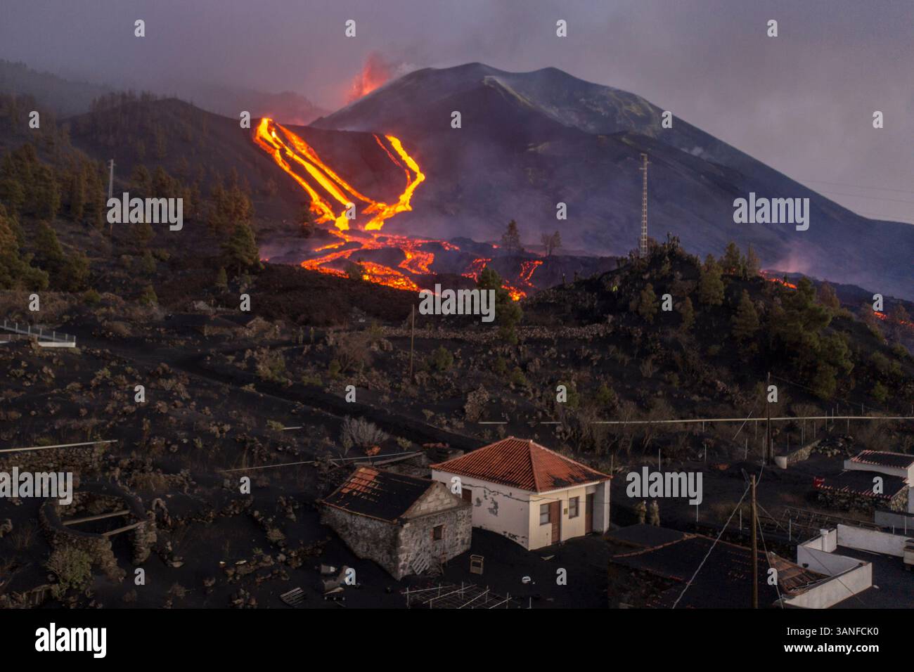 Aerial view of a house with Volcan Cumbre Vieja in background, a ...