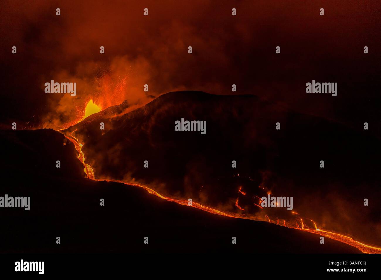 Aerial top down view of lava floating down the Volcan Cumbre Vieja at ...
