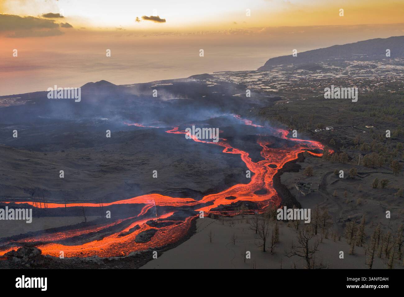 Aerial top down view of lava floating down the Volcan Cumbre Vieja, a ...