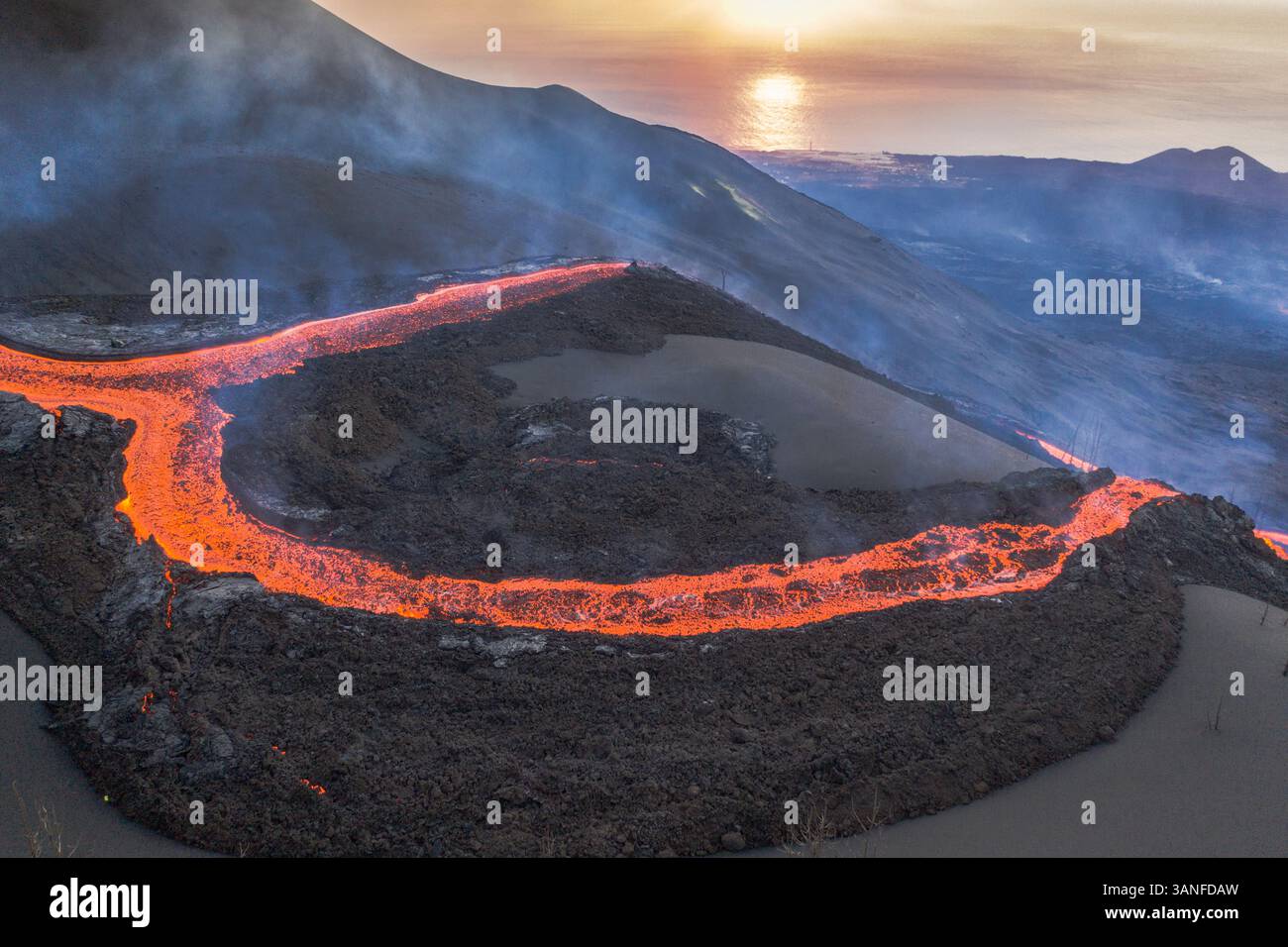 Aerial top down view of lava floating down the Volcan Cumbre Vieja, a ...