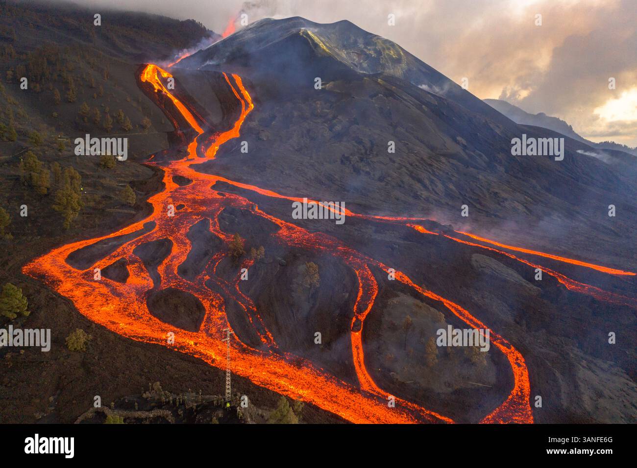 Aerial top down view of lava floating down the Volcan Cumbre Vieja, a ...