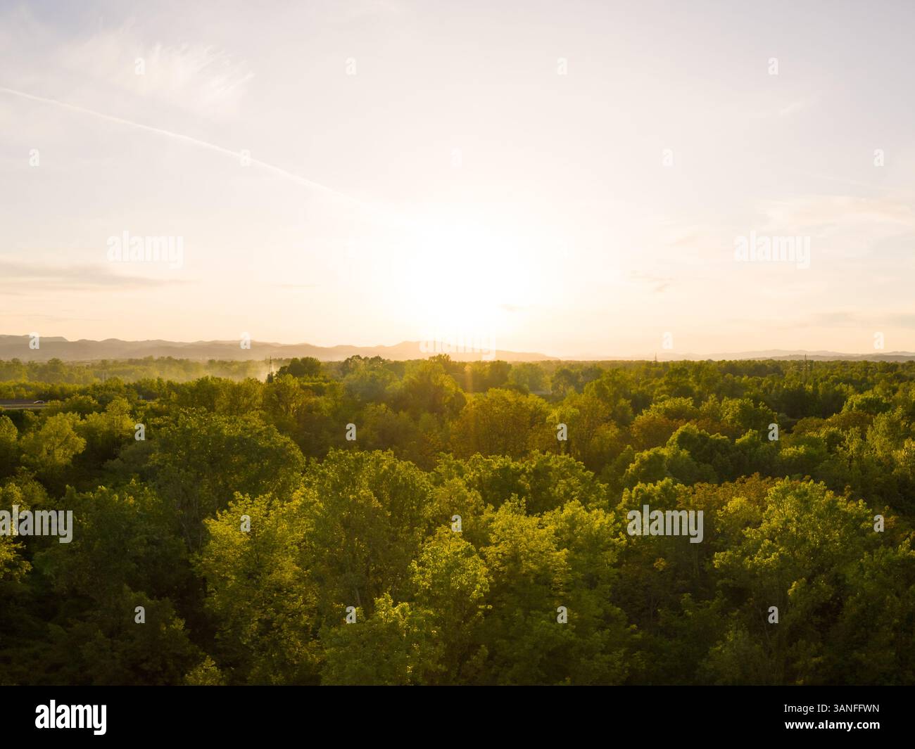 Aerial view of scenic sunset at over the green forest, Zagreb, Croatia ...
