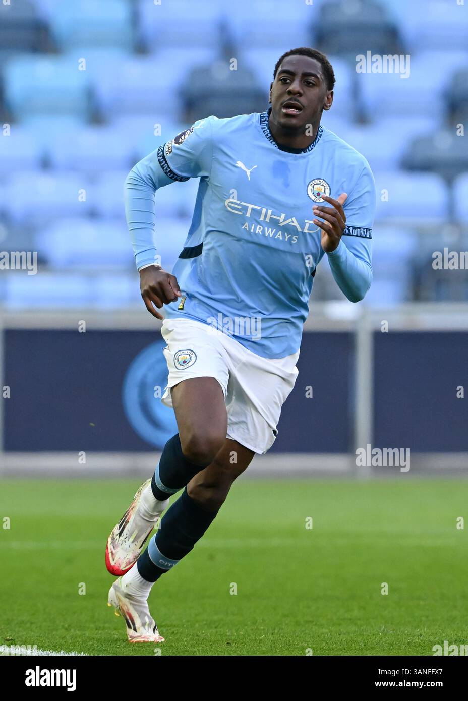Manchester, UK. 14th Apr, 2025. Divin Mubama of Manchester City during ...